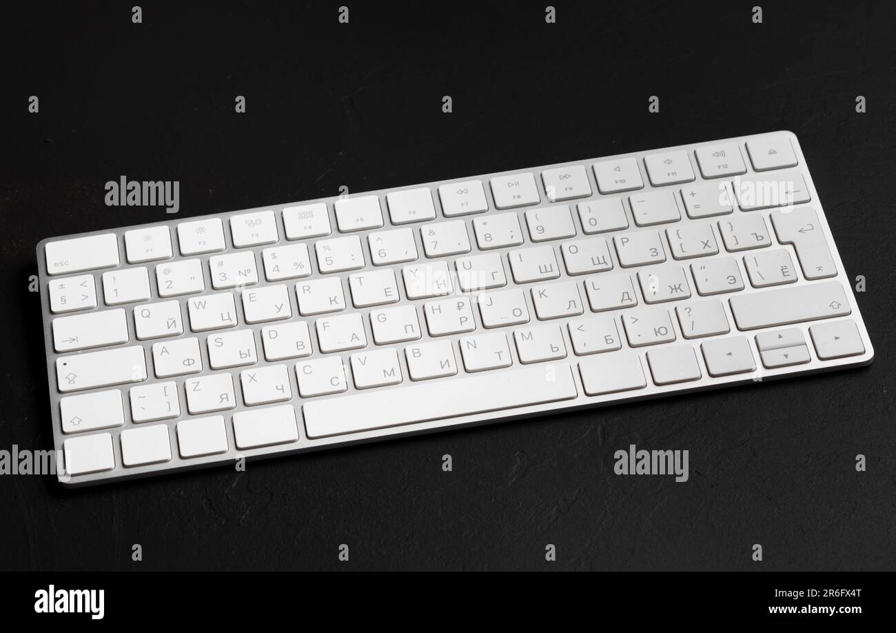 Office table with keyboard Isolated on black background Stock Photo - Alamy