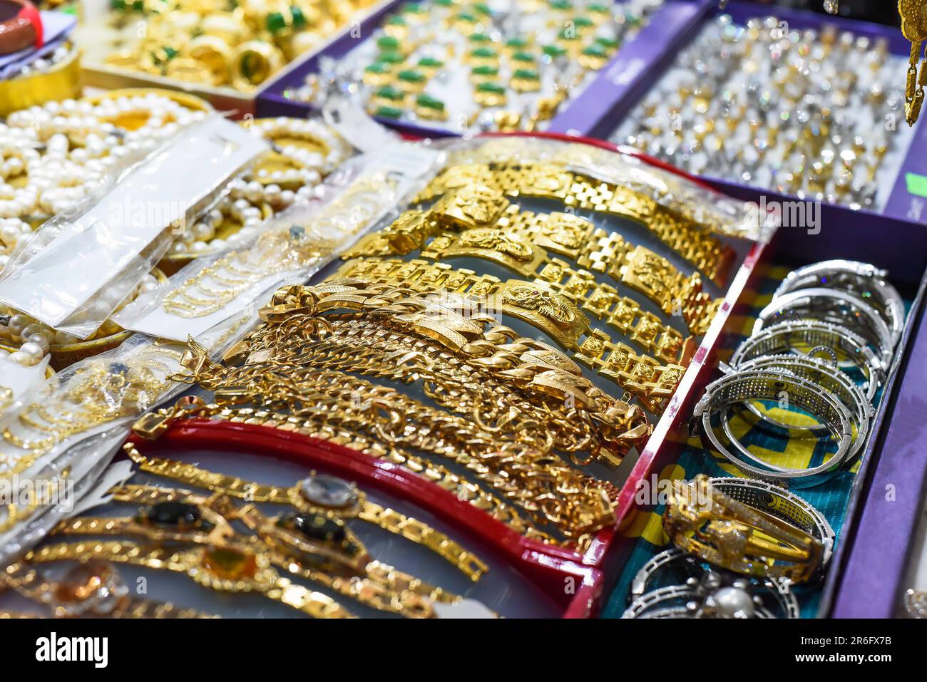 Many artificial gold in vietnamese market Stock Photo - Alamy