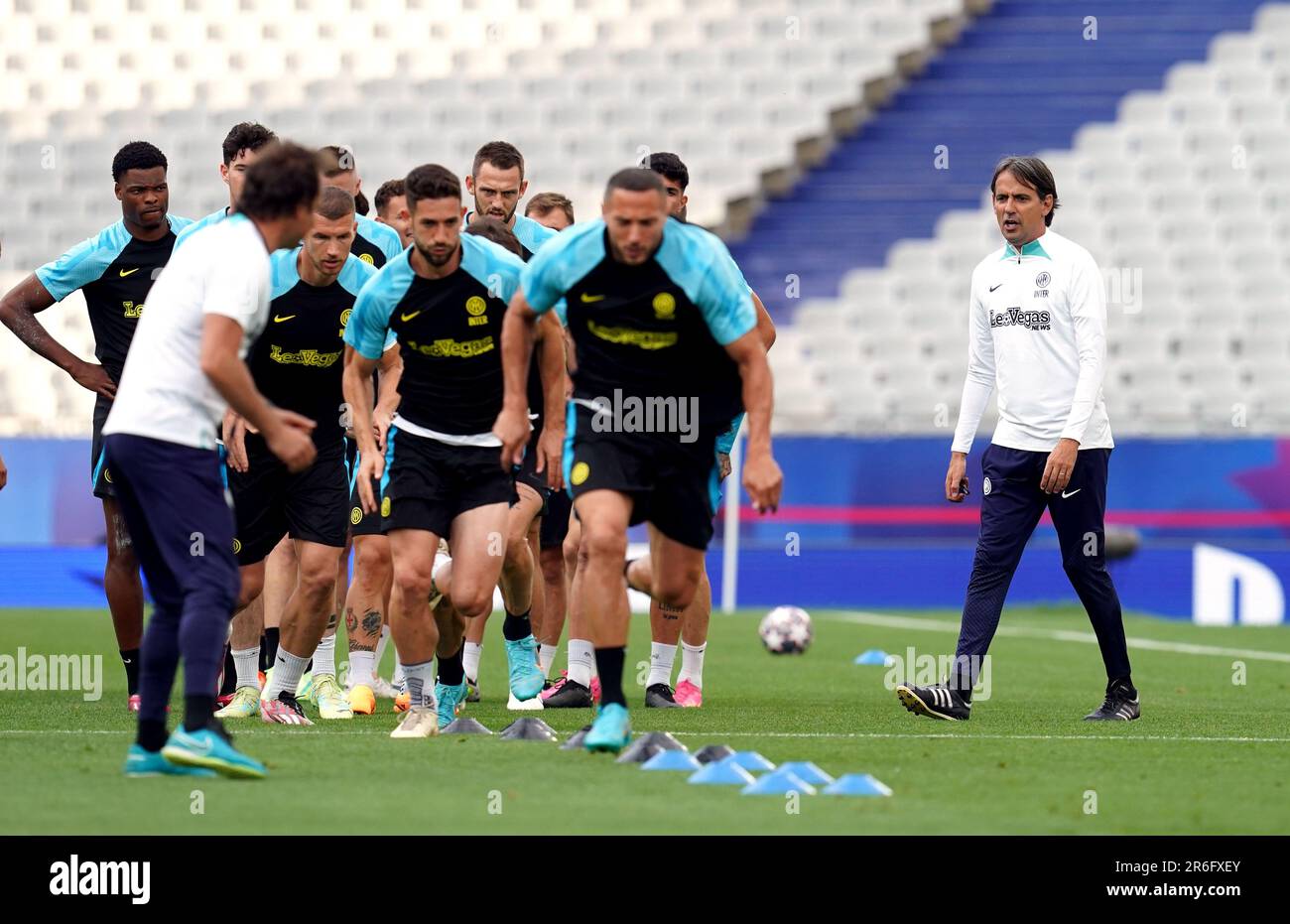 Inter Milan manager Simone Inzaghi (right) during a training session at ...