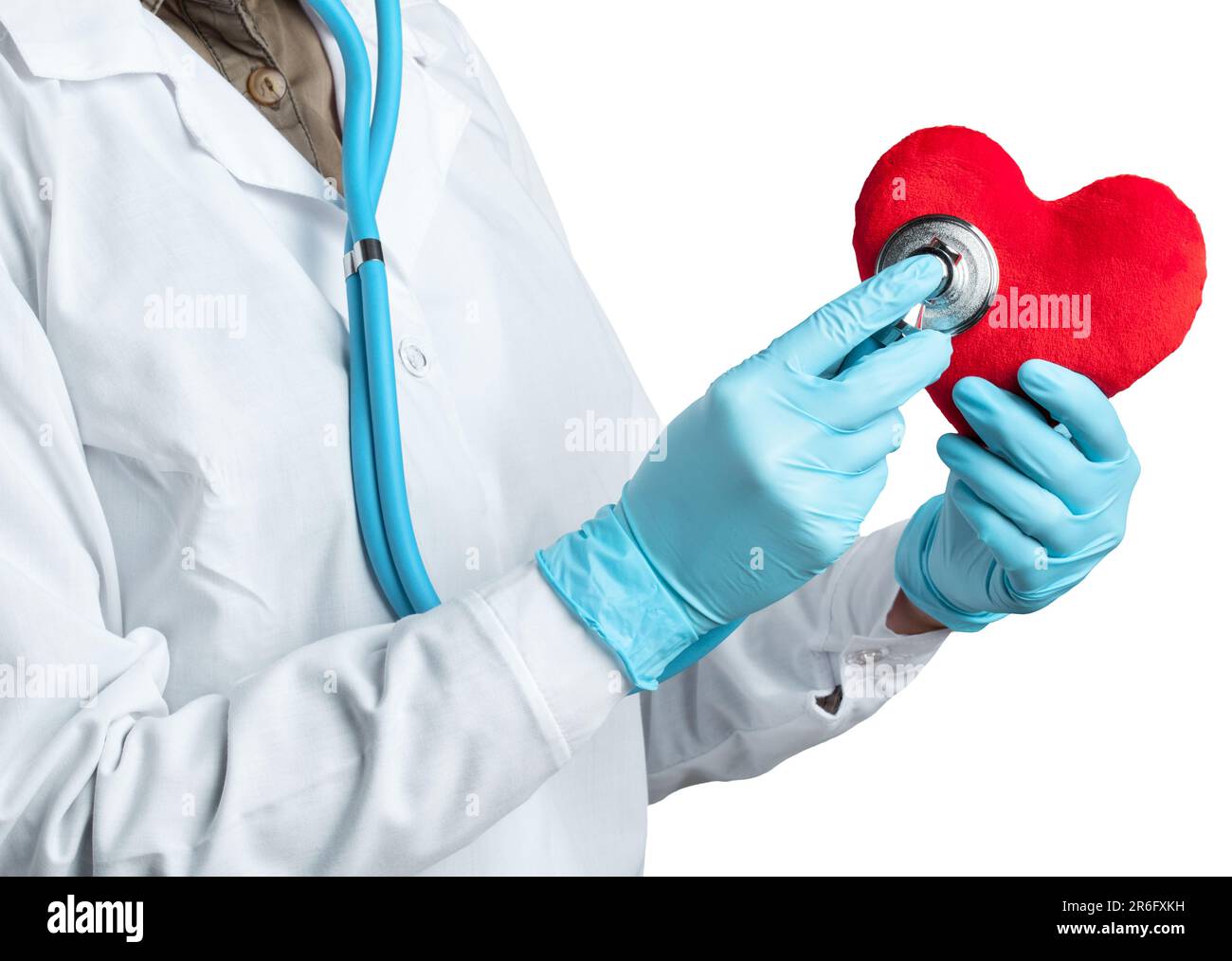 Female cardiologist in uniform holding red heart isolated on the white ...