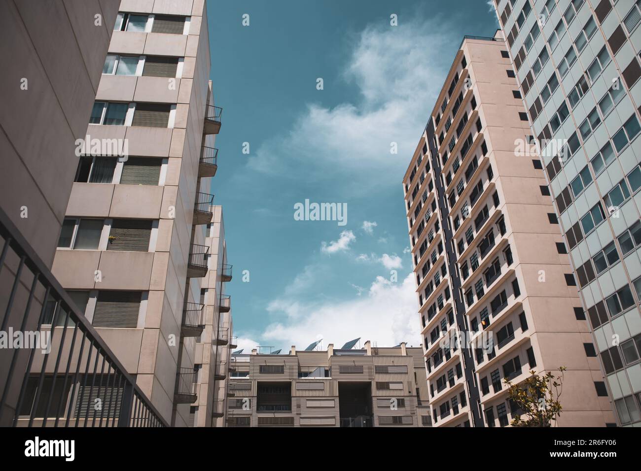 Multifamily tall apartment buildings view from below. A residential ...