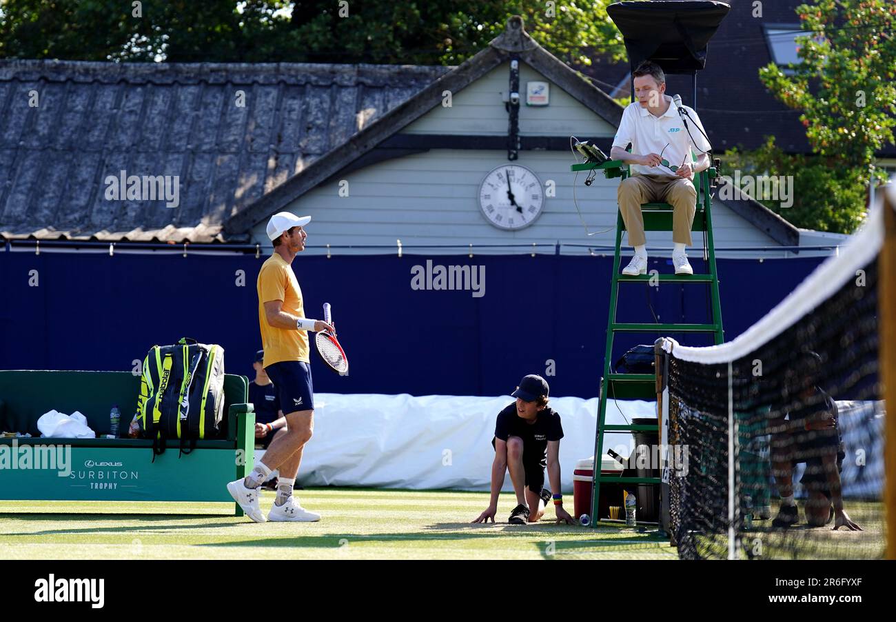Andy Murray speaks with the umpire during his quarter final match ...