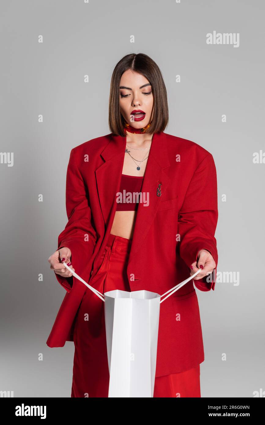 fashionable, generation z, shocked young woman with brunette short hair ...