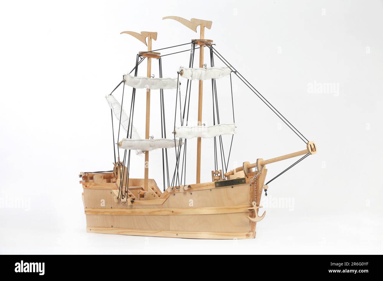 A child's wooden sailing ship toy Stock Photo - Alamy