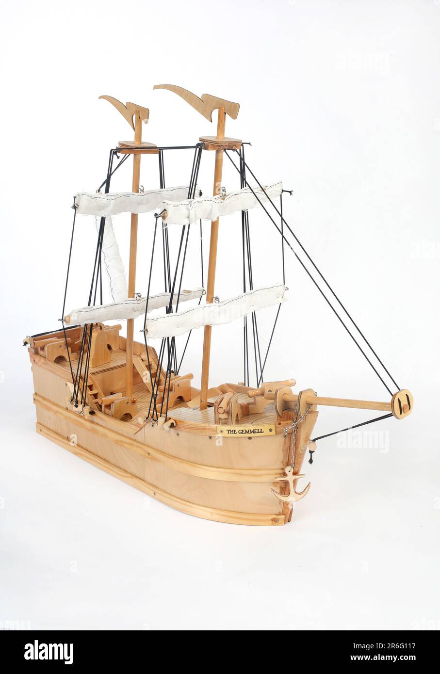 A child's wooden sailing ship toy Stock Photo - Alamy