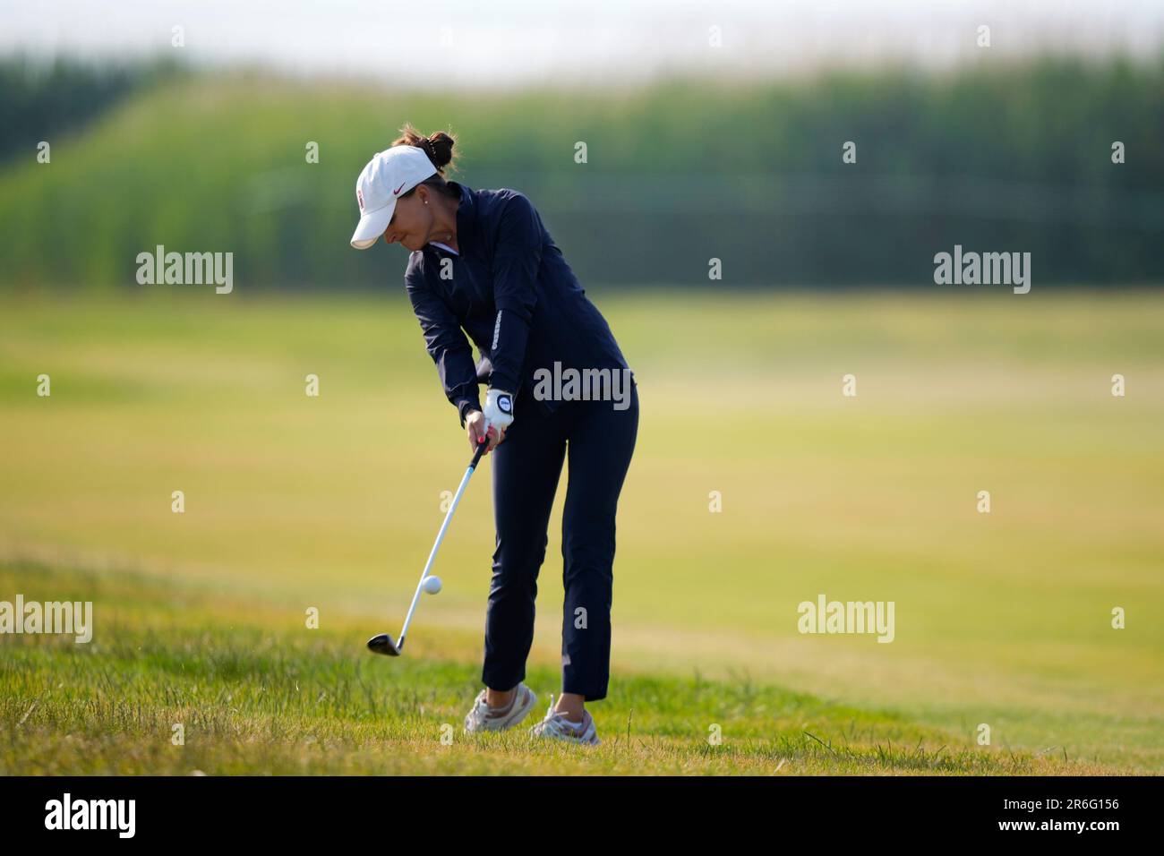 Aline Krauter, of Germany, hits on the third hole during the first ...