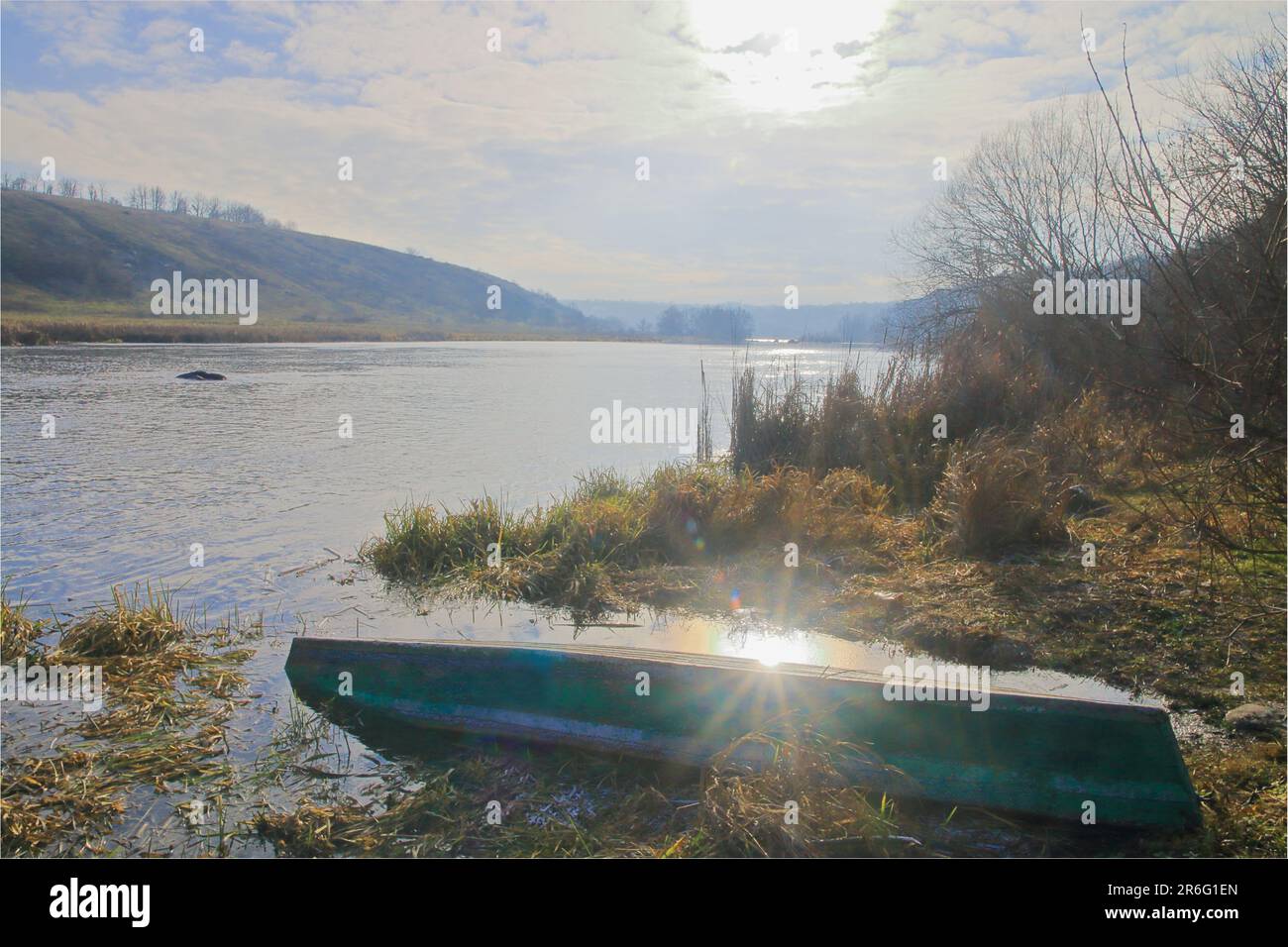 The photograph shows an autumn landscape of the river called the ...