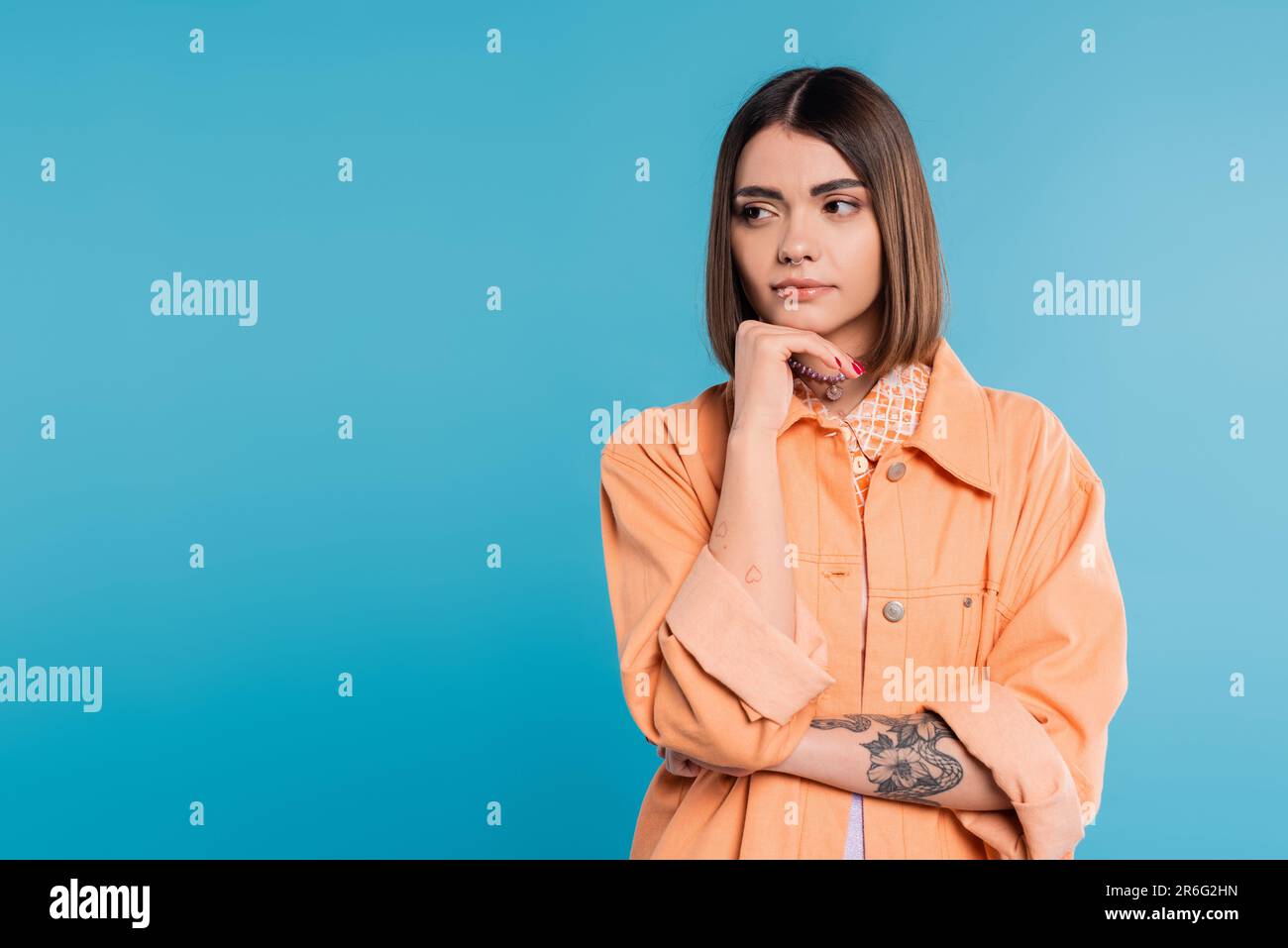 generation z, portrait of concerned woman, young fashion model looking ...