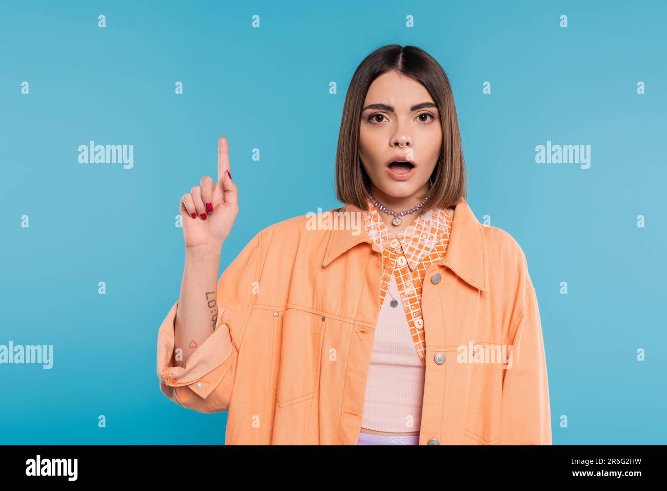 Shocked woman short hair in hi-res stock photography and images - Alamy