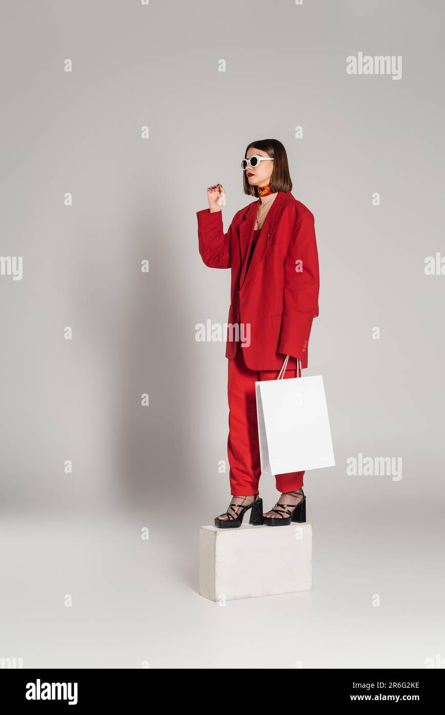 generation z, consumerism, young woman with brunette short hair and ...