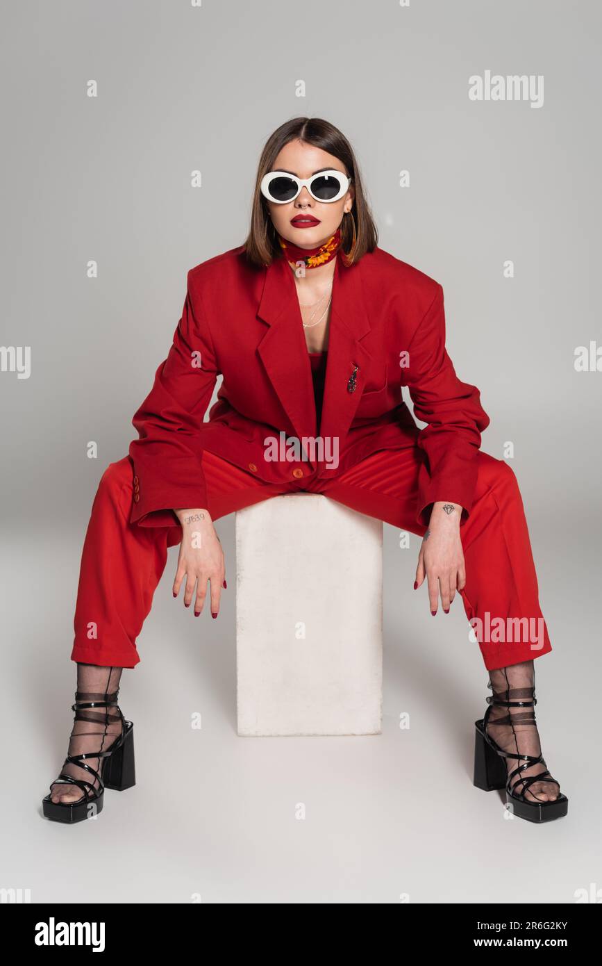 generation z, fashion model with brunette short hair and nose piercing ...