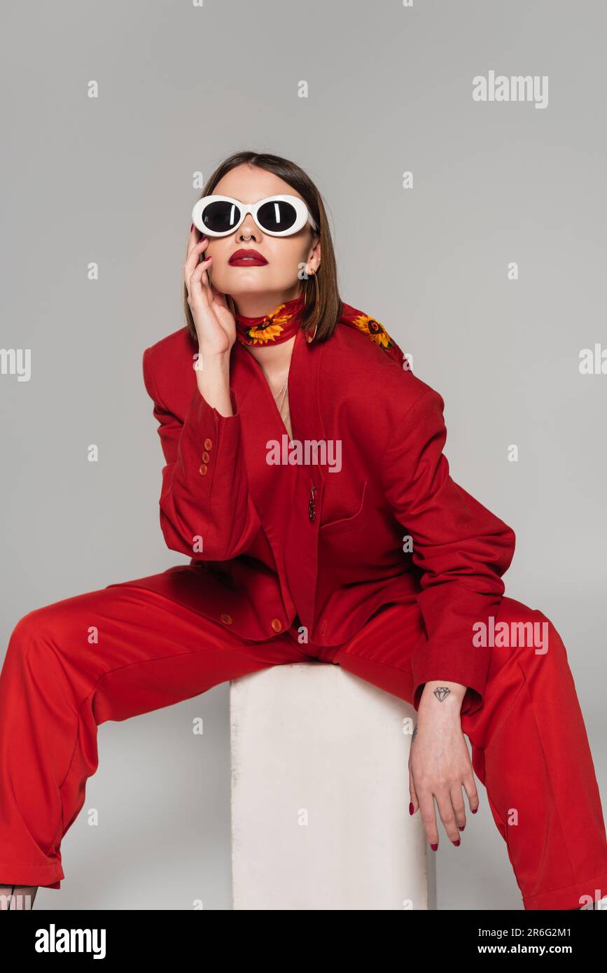 generation z, fashion model with brunette short hair and nose piercing ...