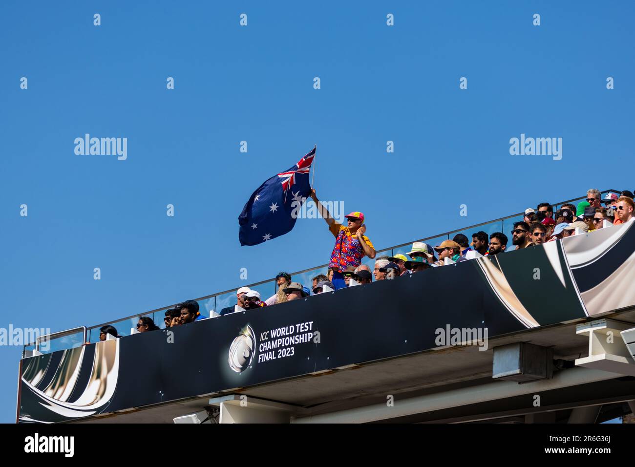 An Australia fan holds up their flag in the stands during day three of ...