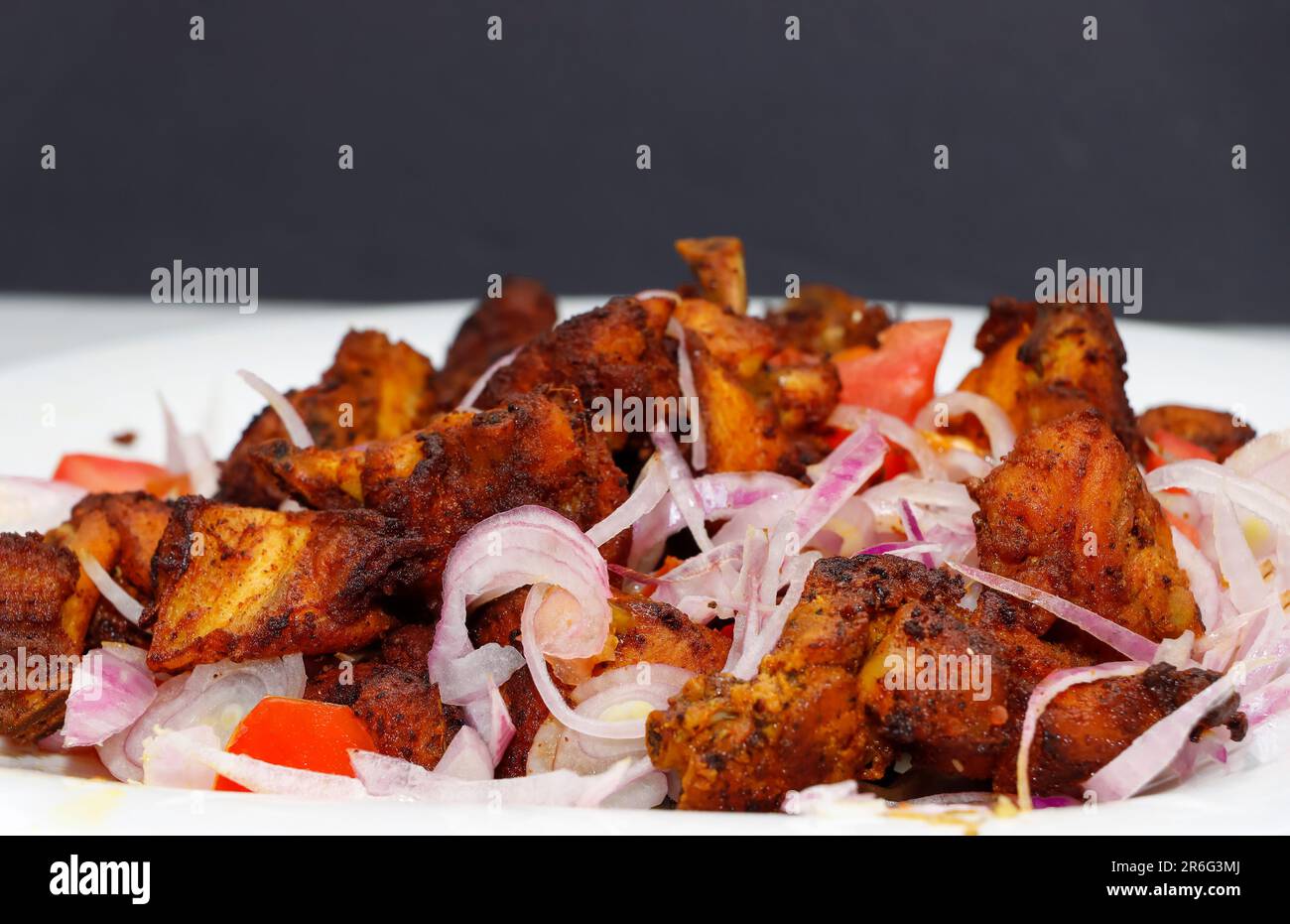 Closeup Image Of Tasty Indian Style Chicken Fry In White And Black ...