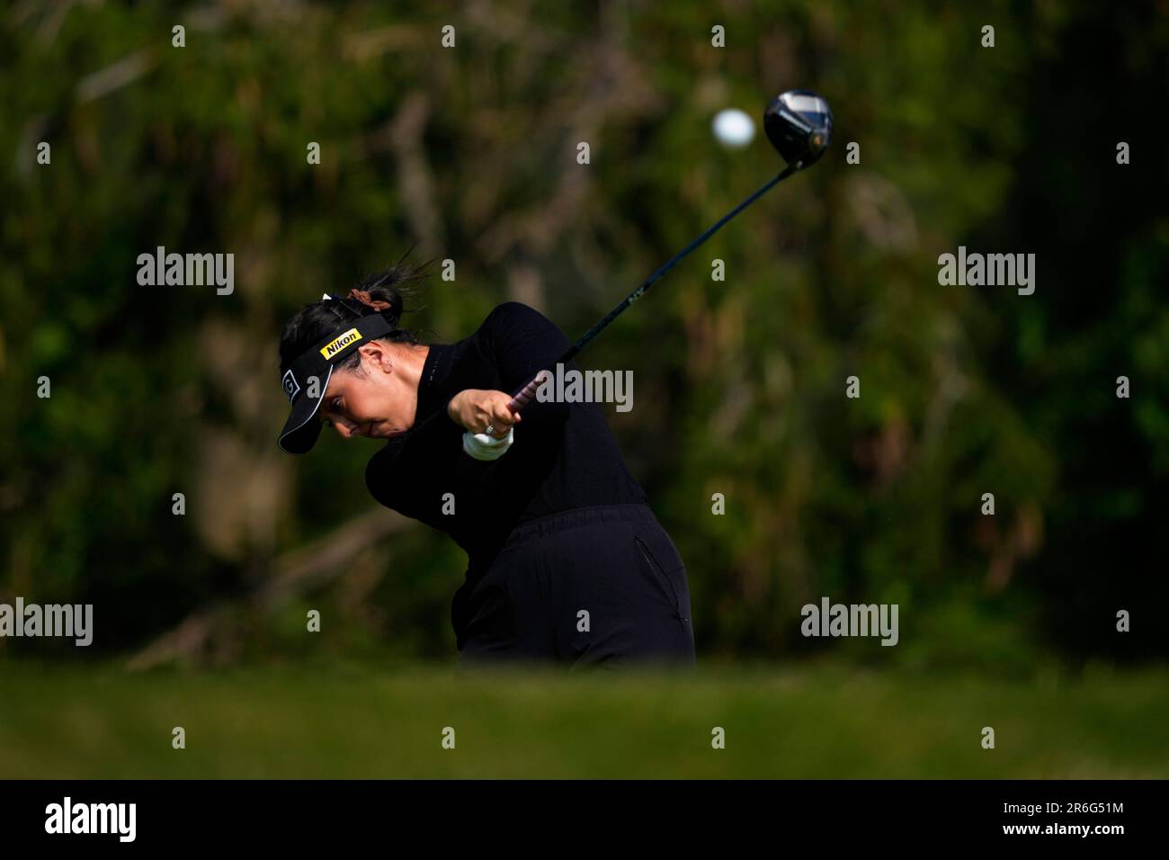 Georgia Hall, of England, tees off on the 14th hole during the first ...