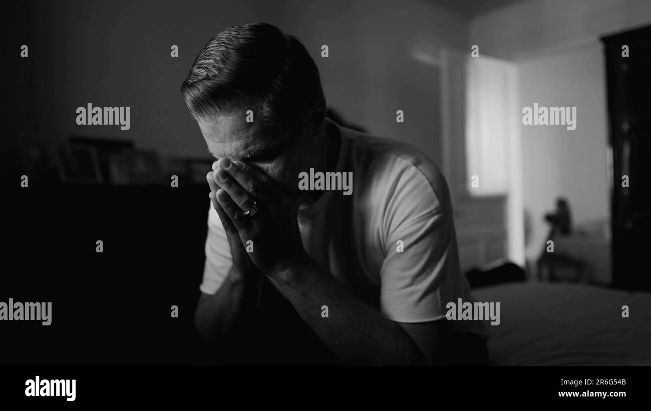 Monochrome Depiction of Middle-Aged Man Covering Face in Shame ...