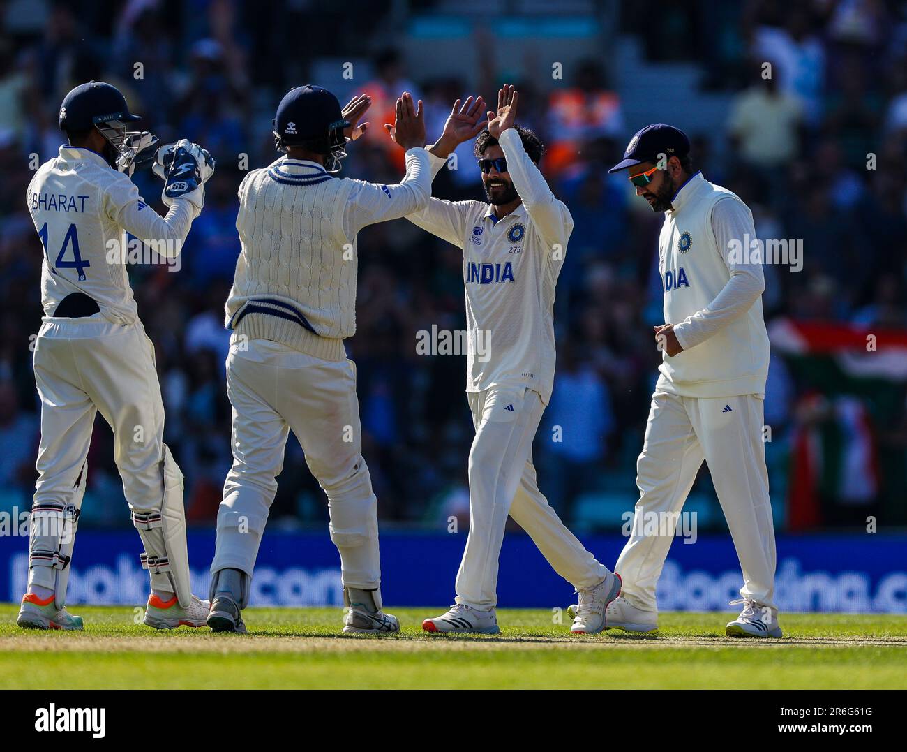 India’s Ravindra Jadeja celebrates taking the wicket of Australia’s ...