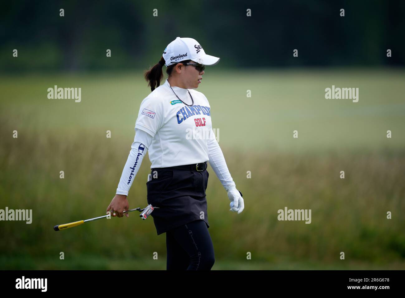 Minami Katsu, of Japan, walks on the 11th green during the first round ...