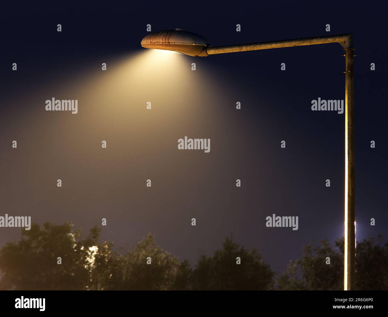 Ray of light from a street lamp Stock Photo - Alamy