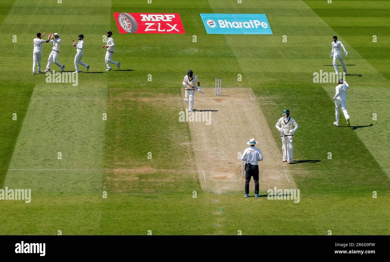 Australia's David Warner walks off the pitch after losing his wicket to ...