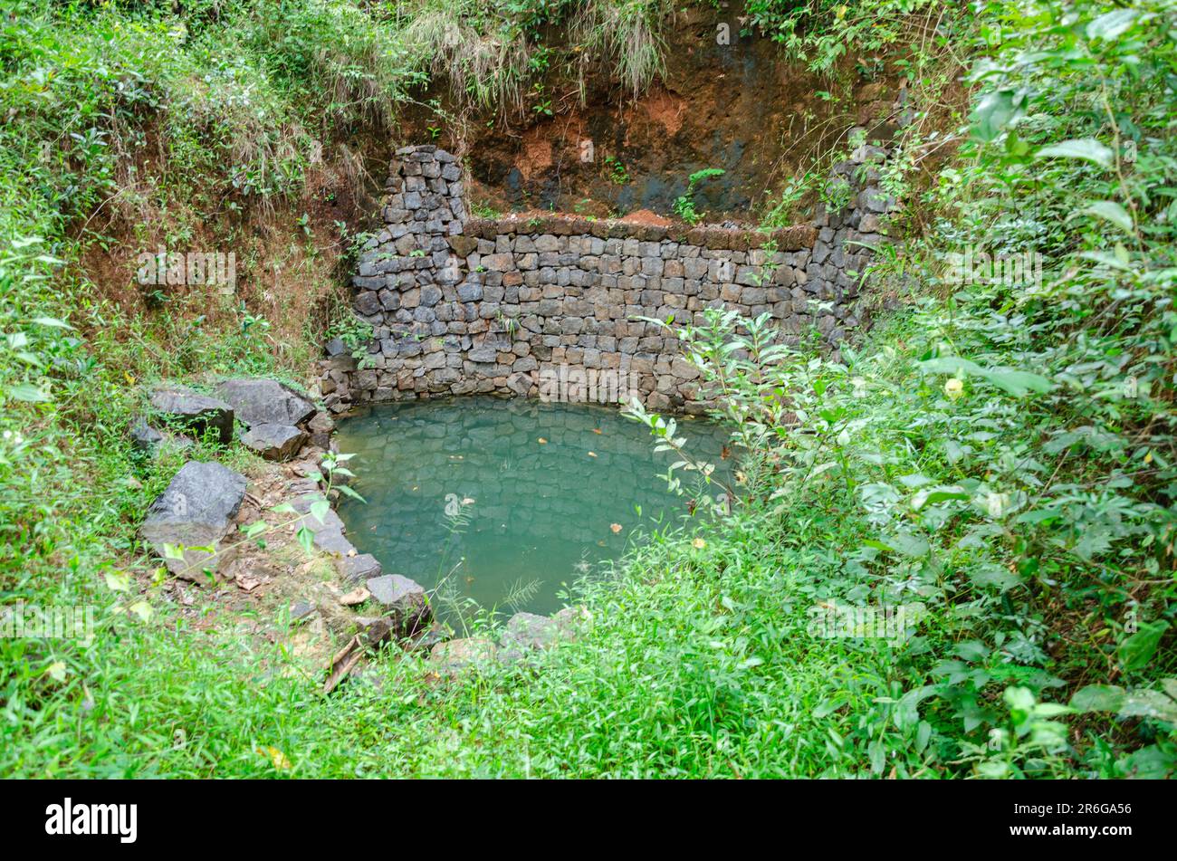 Open spring water well in a village in India Stock Photo - Alamy