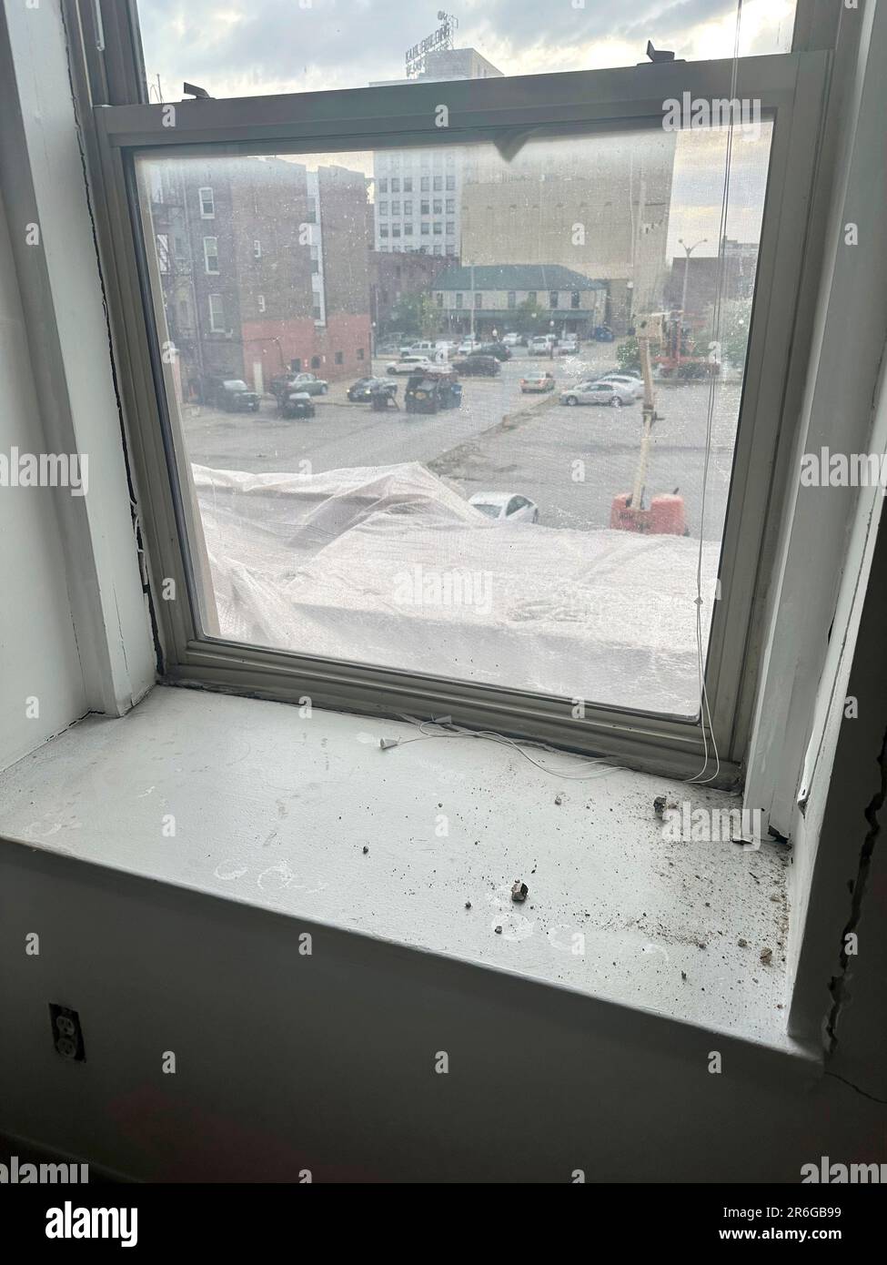 Cracks run along the wall and the window sill in an apartment rented by ...
