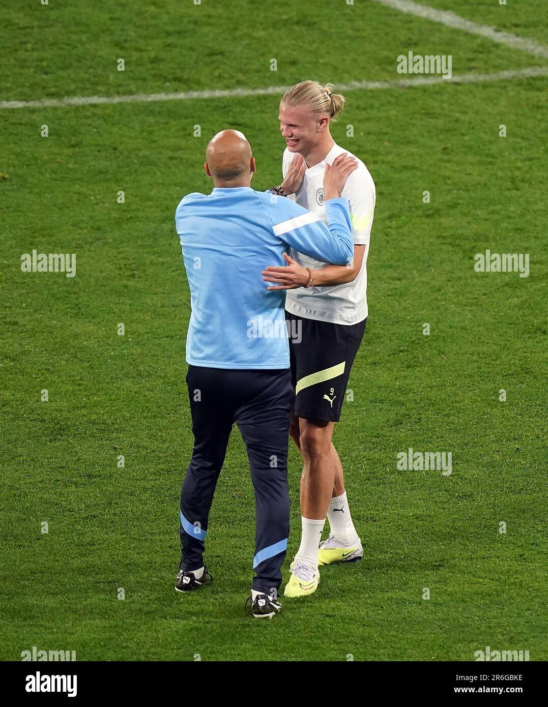 Manchester City manager Pep Guardiola and Erling Haaland during a training session at the ...