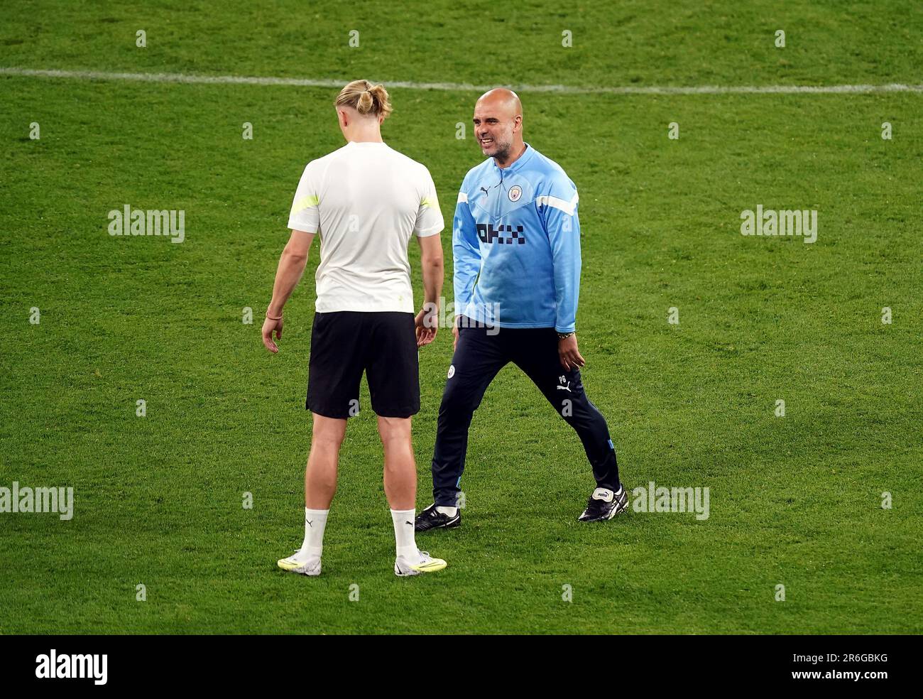 Manchester City manager Pep Guardiola and Erling Haaland during a training session at the ...