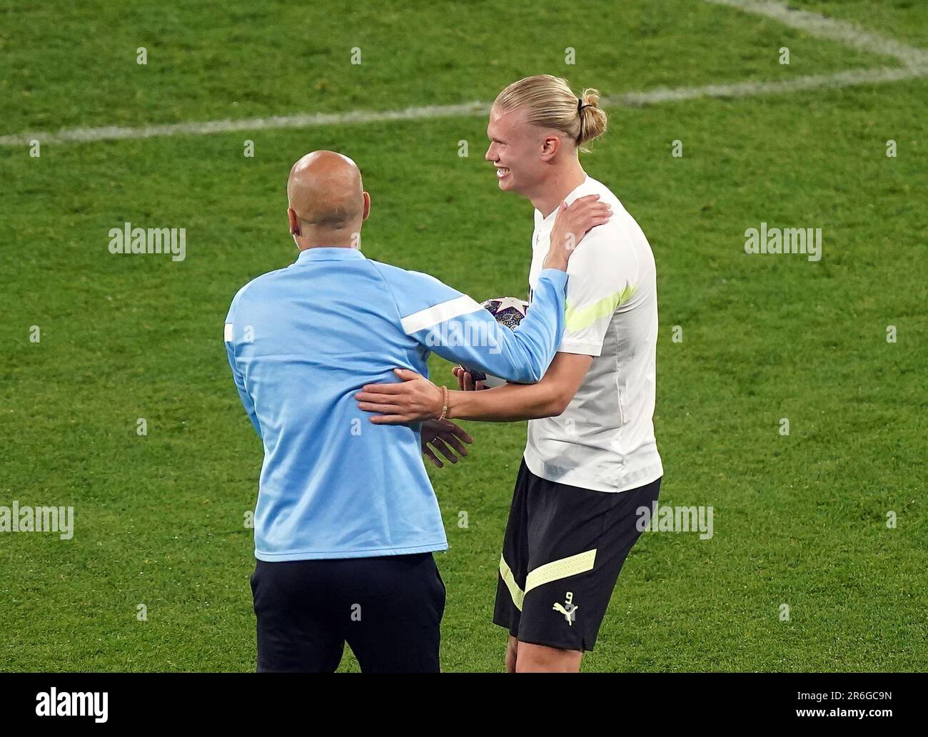 Manchester City manager Pep Guardiola and Erling Haaland during a ...