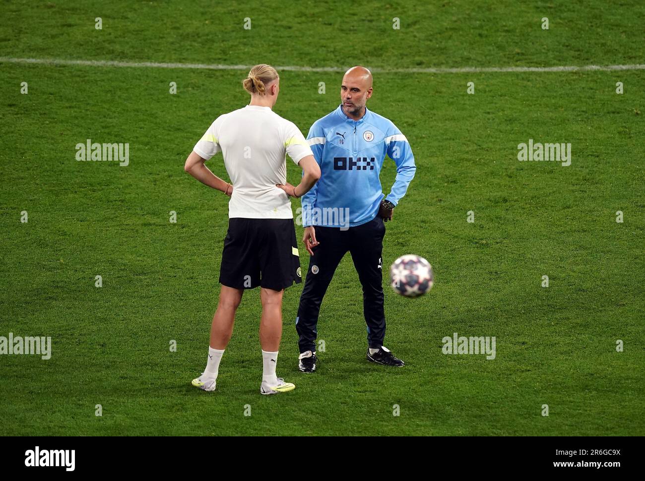 Manchester City manager Pep Guardiola and Erling Haaland during a training session at the ...