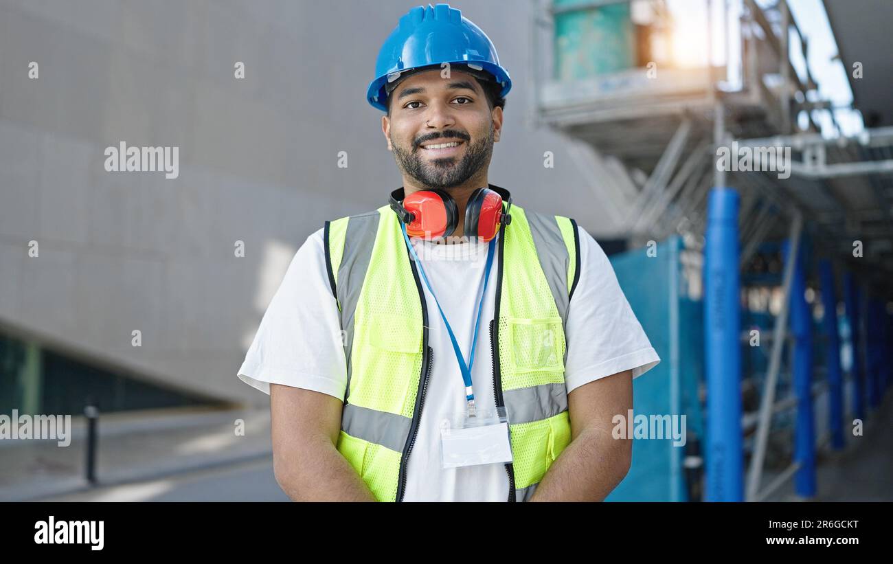 African american man builder smiling confident standing at street Stock ...