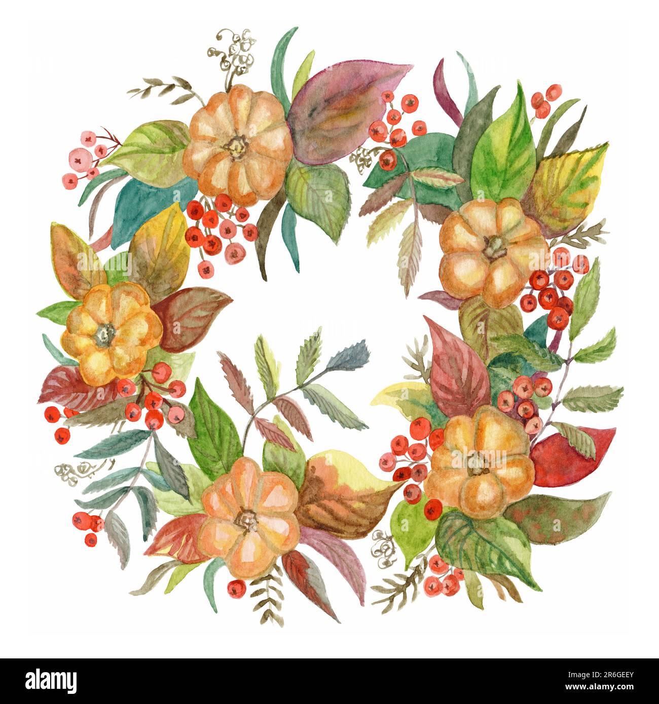 A wreath of pumpkins, leaves and rowan berries in warm colors with an ...