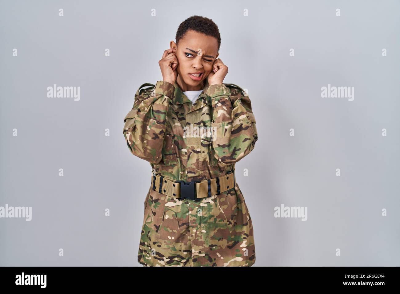 Beautiful african american woman wearing camouflage army uniform ...