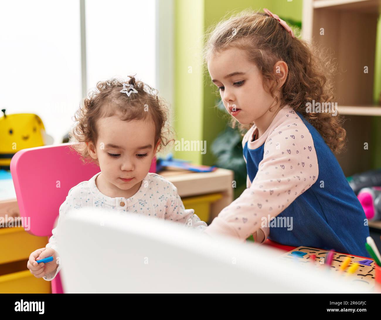 Adorable girls preschool students hi-res stock photography and images ...
