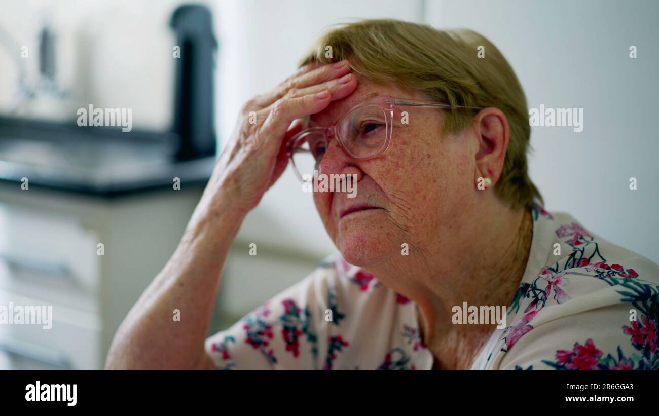 Preoccupied senior woman feeling anxiety ruminates problems. Elderly ...