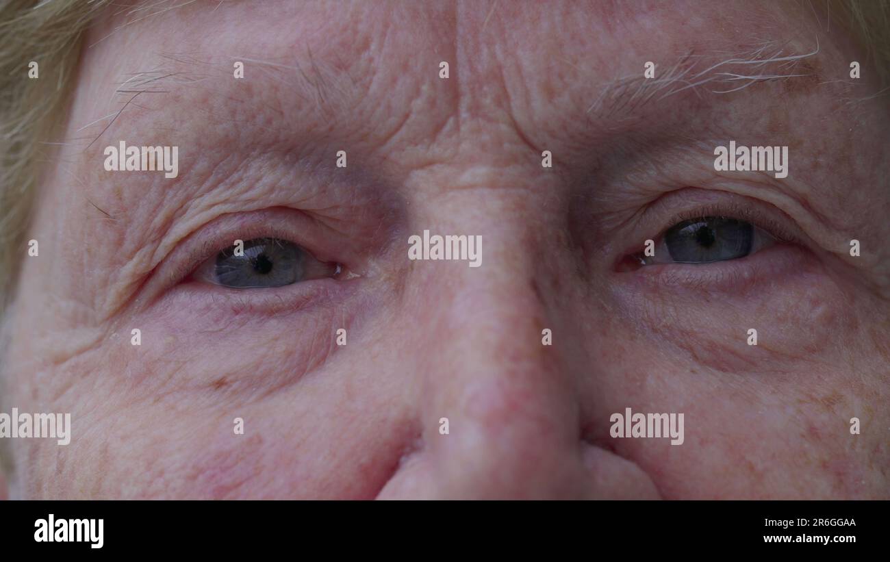 Senior Woman Macro Close-up Staring at camera, wrinkled elderly older ...