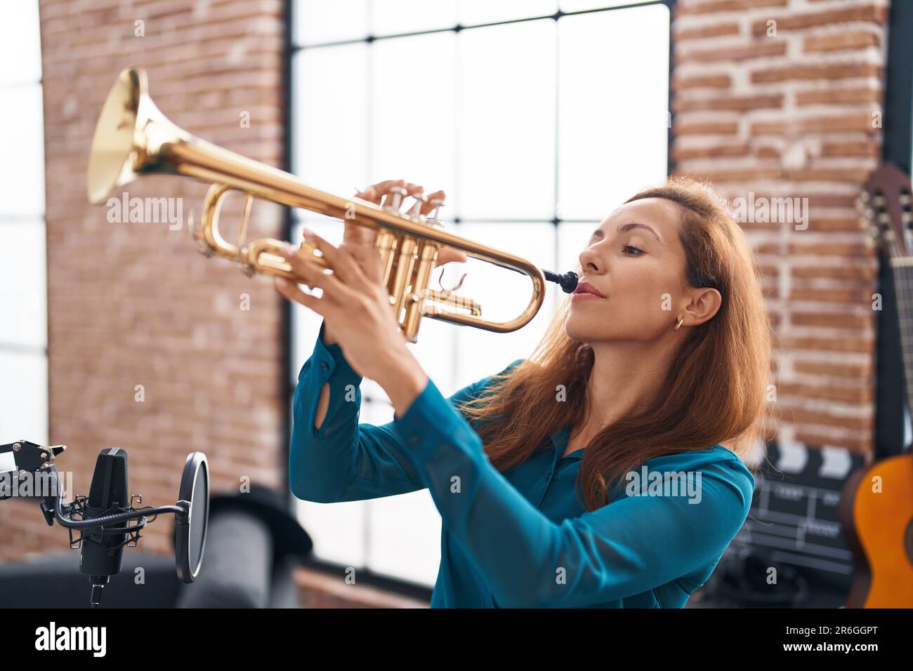 Young female trumpet player hi-res stock photography and images - Alamy