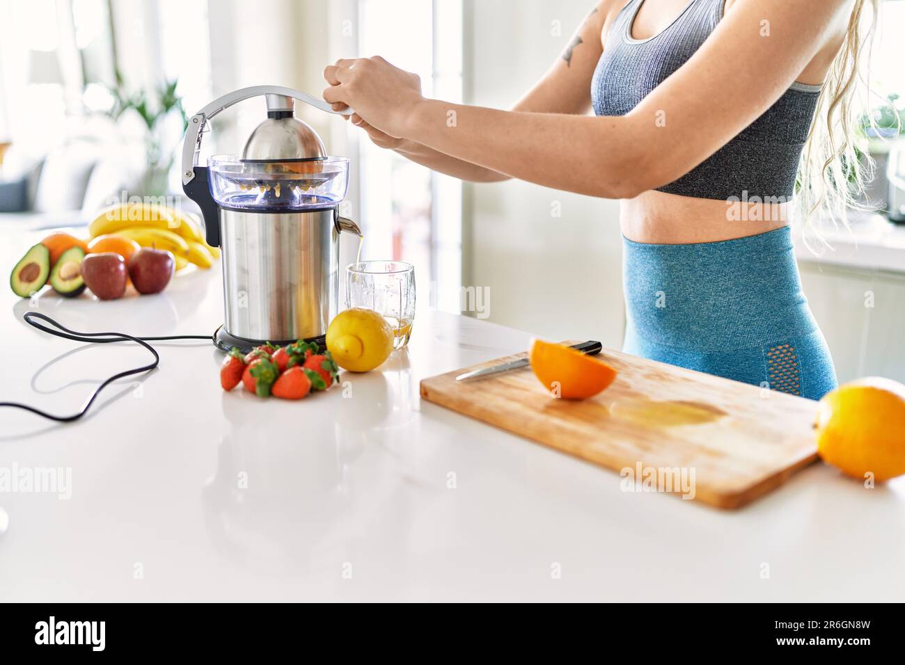 Attractive female using blender hi-res stock photography and images - Alamy