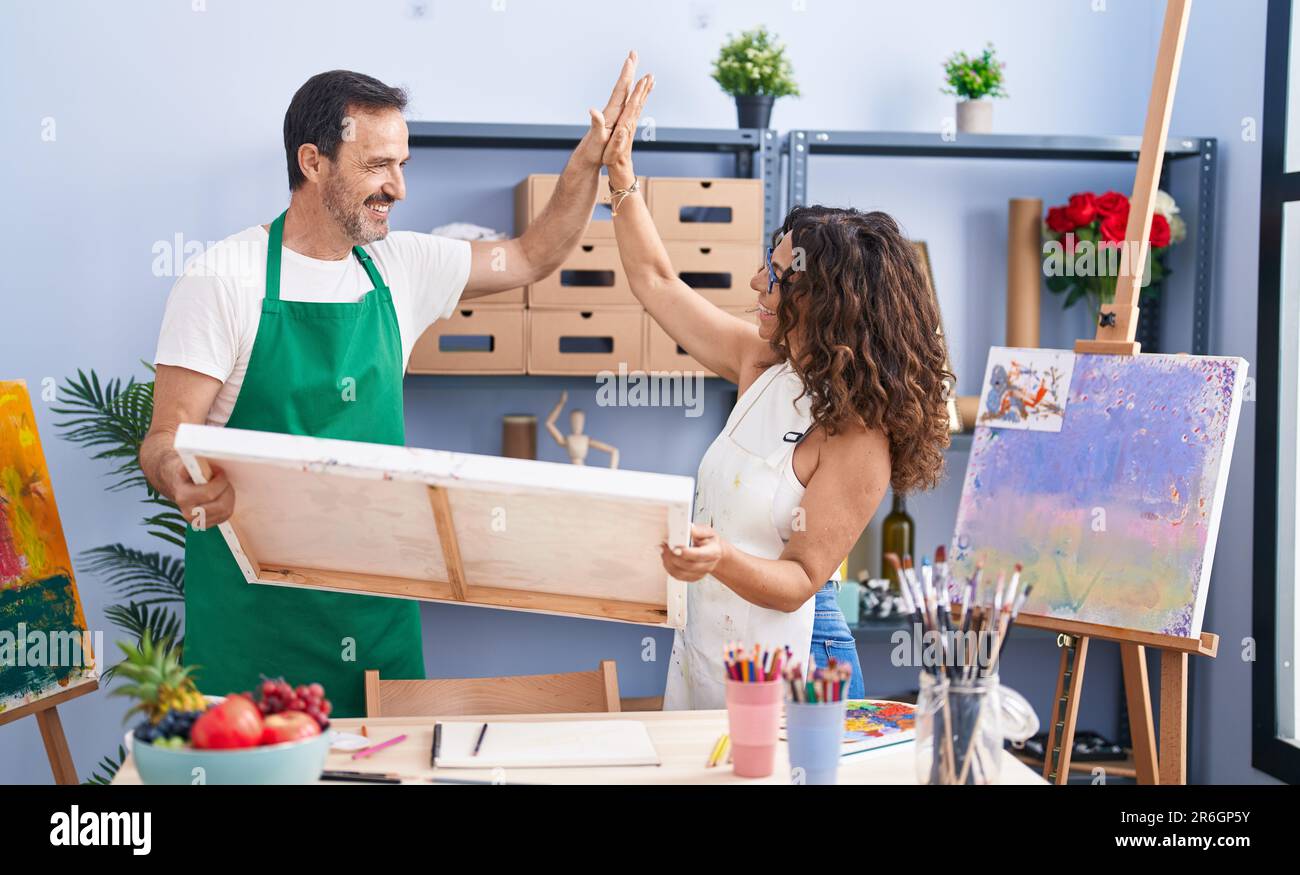 Hands raised high painting hi-res stock photography and images - Alamy