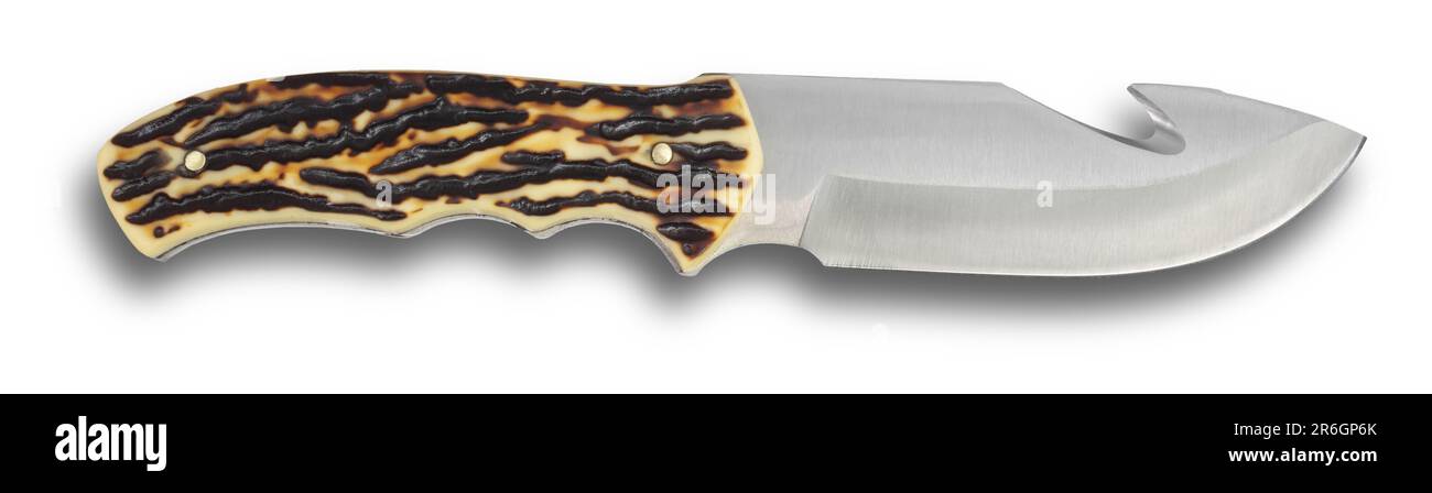 Hunting knife with guy hook and stag handle with shadow below Stock ...