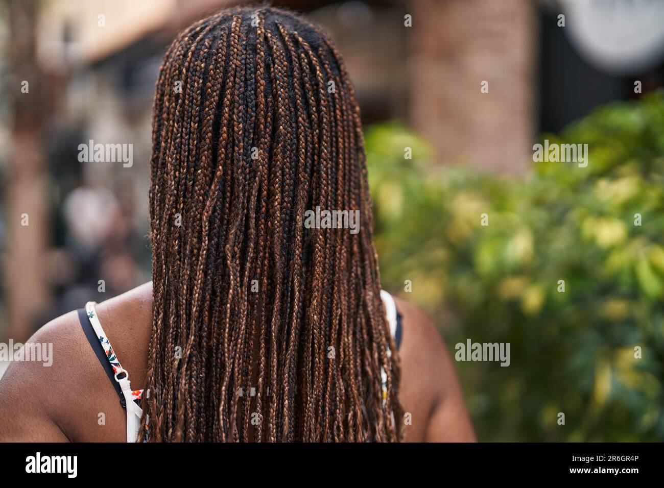 African american woman standing on back view at street Stock Photo - Alamy