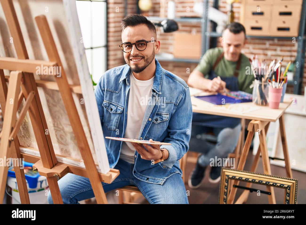 Two men artists smiling hi-res stock photography and images - Alamy