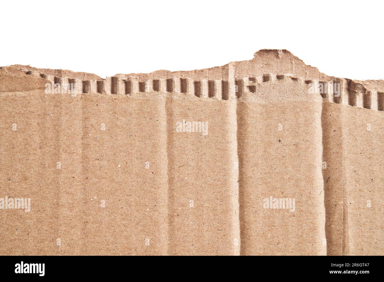 One ripped piece of cardboard material over isolated white background ...