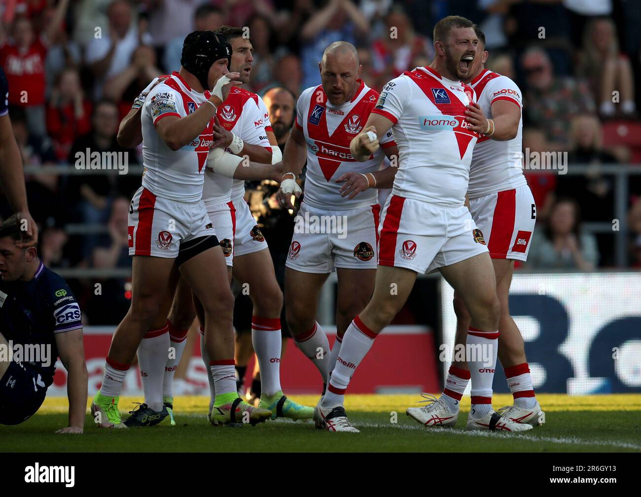 St Helens’ Joe Batchelor celebrates scoring his sides first try during ...