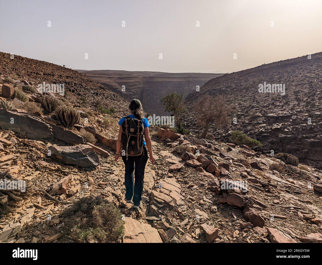 Hiking through the stone desert near Amtoudi in the Anti-Atlas, Morocco ...