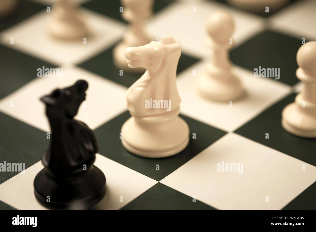 Chess game with close-up of chess pieces Stock Photo - Alamy