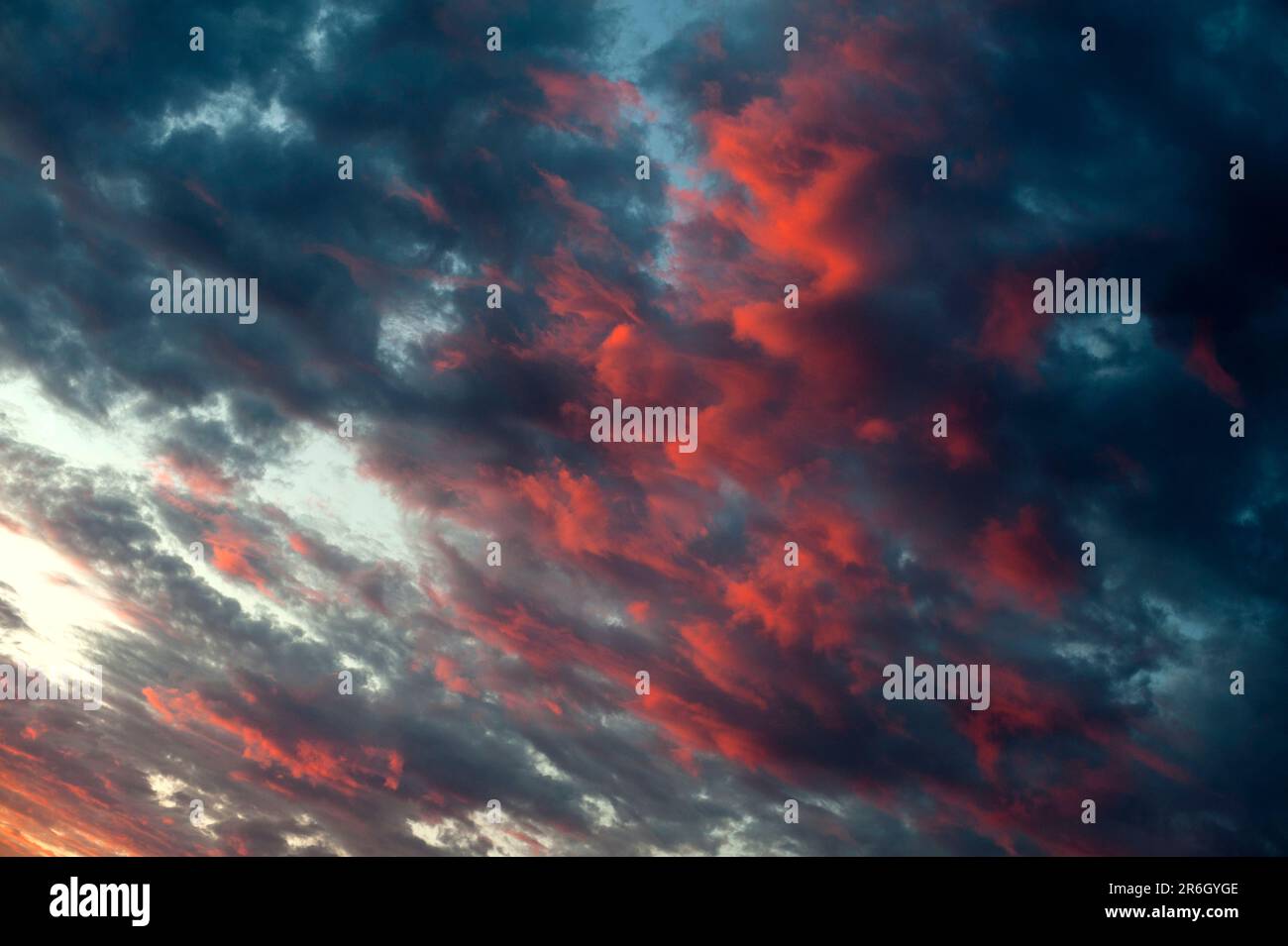 Altocumulus perlucidus clouds dramatic sunset Stock Photo - Alamy