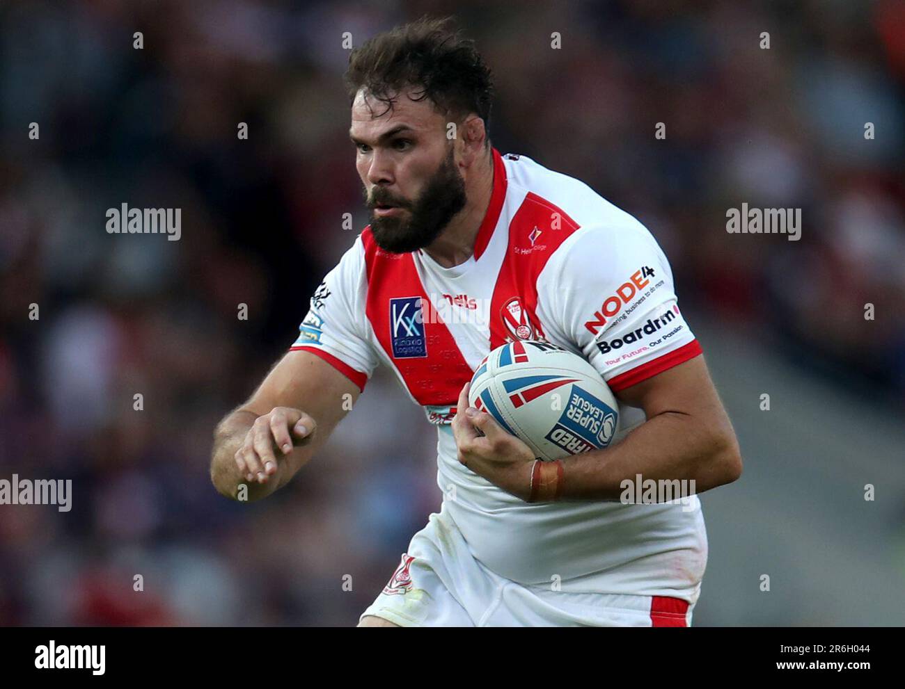St Helens’ Alex Walmsley takes on Wigan Warriors’ Cade Cust during the ...