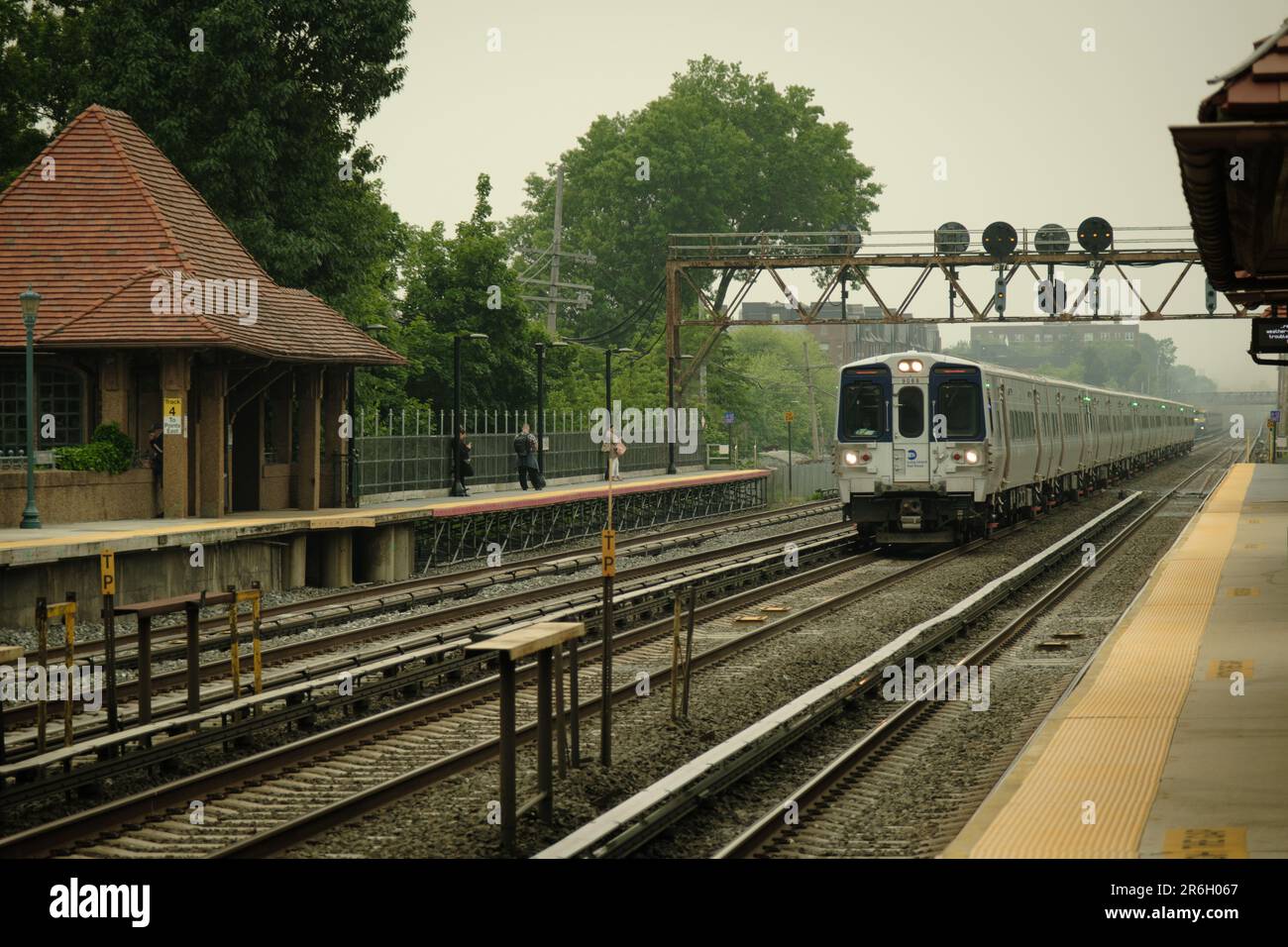 Long Island Railroad train approaching at Forest Hills, Queens, New ...