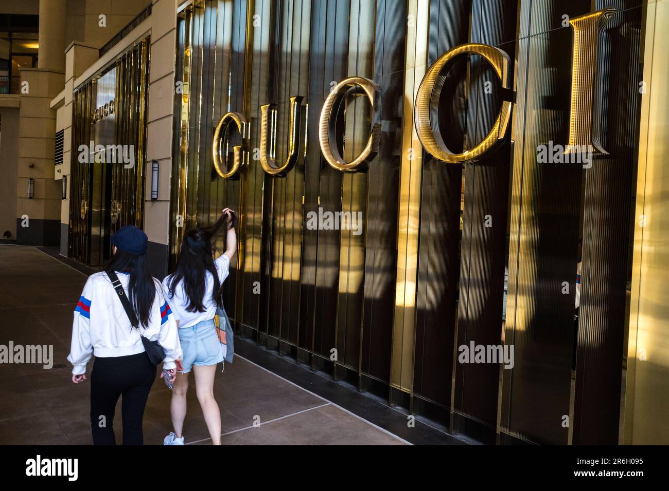 Seattle, USA. 13th May, 2023. People walking past Guggi at the Bravern ...